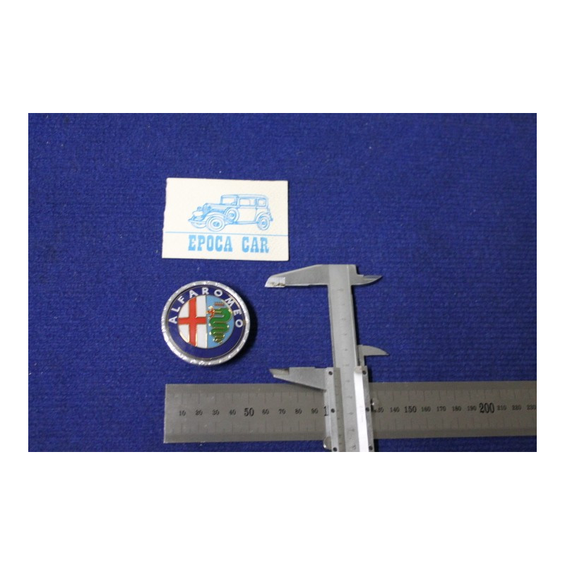 PLASTIC BADGE 52 DIAMETER ( WHITE WORDS)